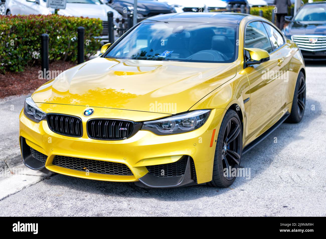 Miami Beach, Florida USA - April 15, 2021: yellow bmw m4, corner view ...