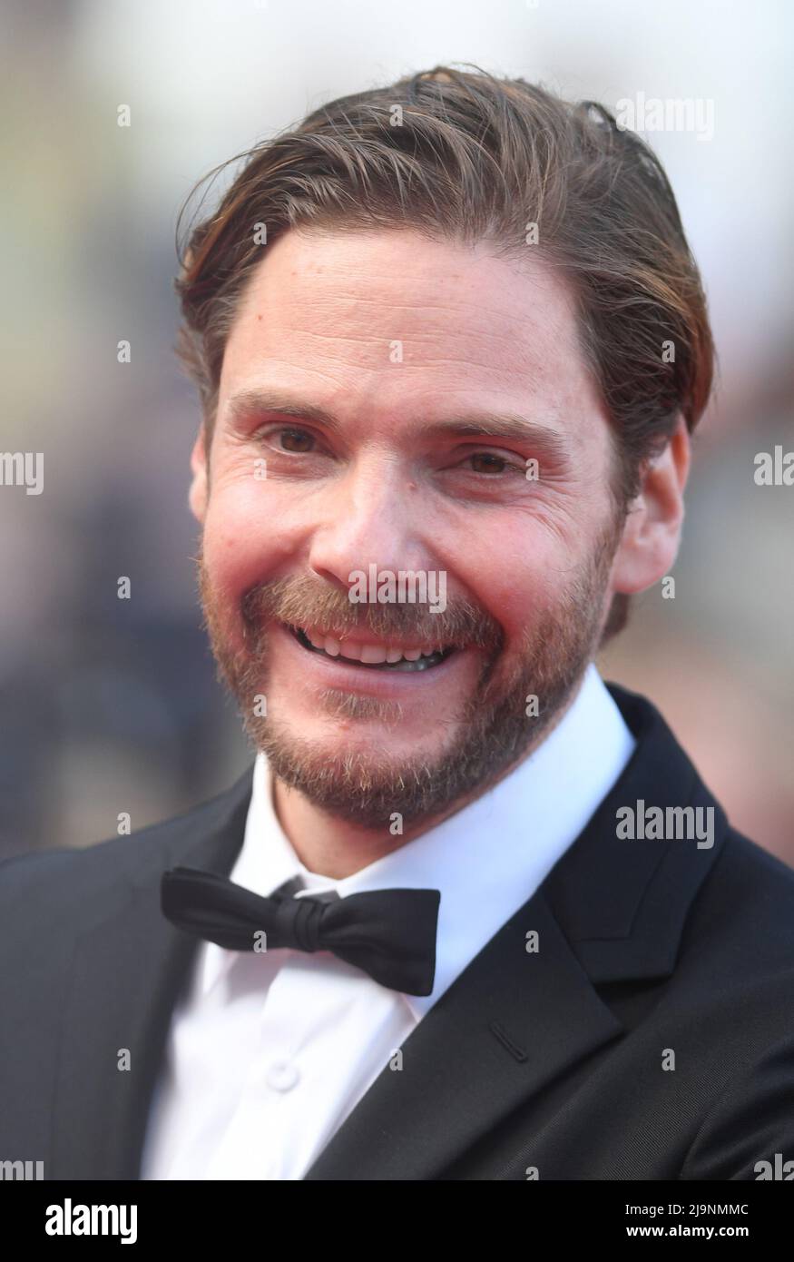 Cannes, France. 24th May, 2022. German actor Daniel Bruhl attends the ...