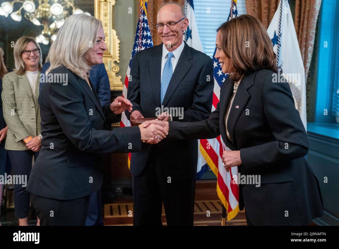 US Vice President Kamala Harris (R) shakes hands with Alina Romanowski ...