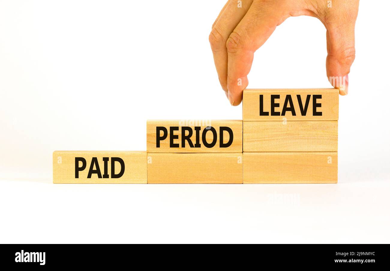Paid period leave symbol. Concept words Paid period leave on wooden ...
