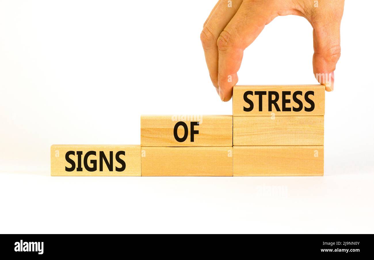 Signs of stress symbol. Concept words Signs of stress on wooden blocks ...