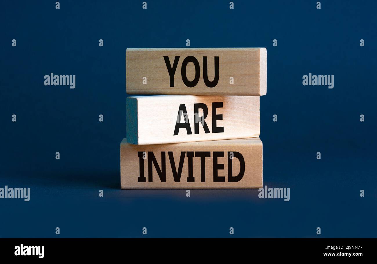 You are invited symbol. Concept words You are invited on wooden blocks ...