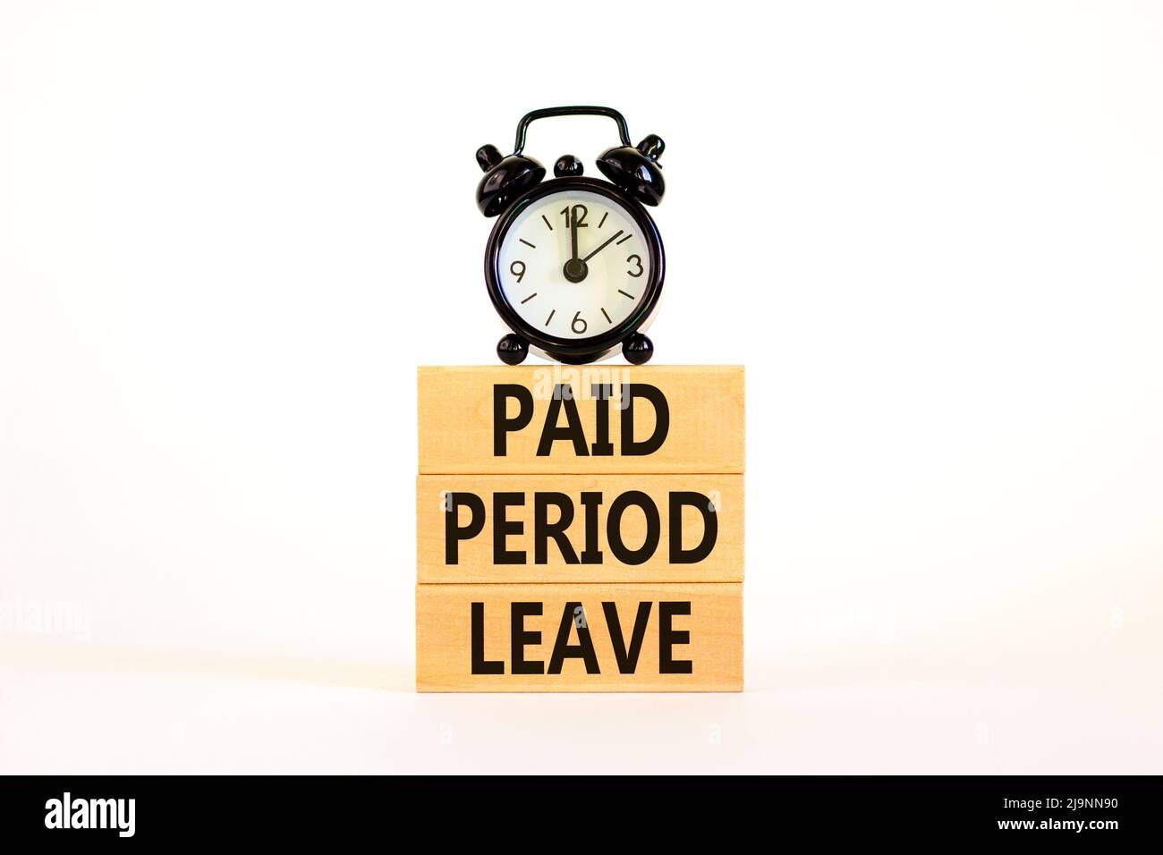 Paid period leave symbol. Concept words Paid period leave on wooden ...