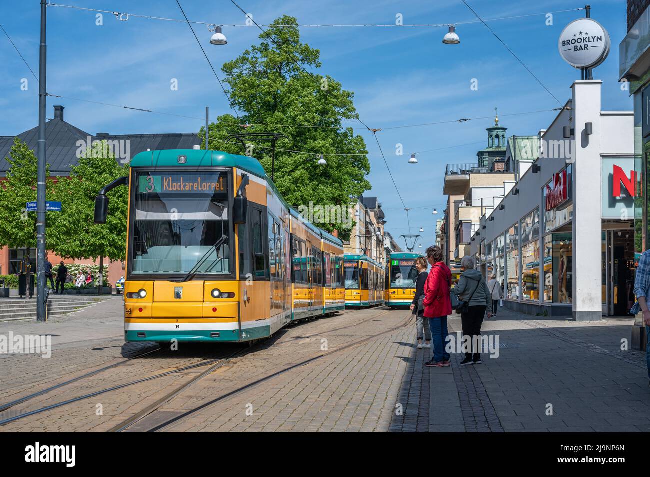 Tram on Drottningatan in the city center of Norrkoping, Sweden. The ...