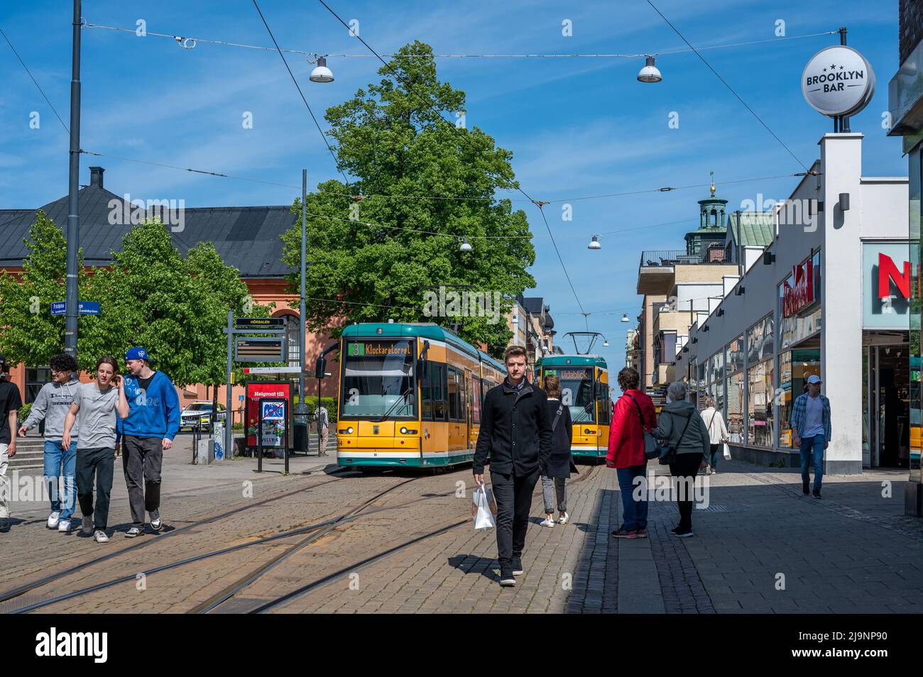 Tram on Drottningatan in the city center of Norrkoping, Sweden. The ...