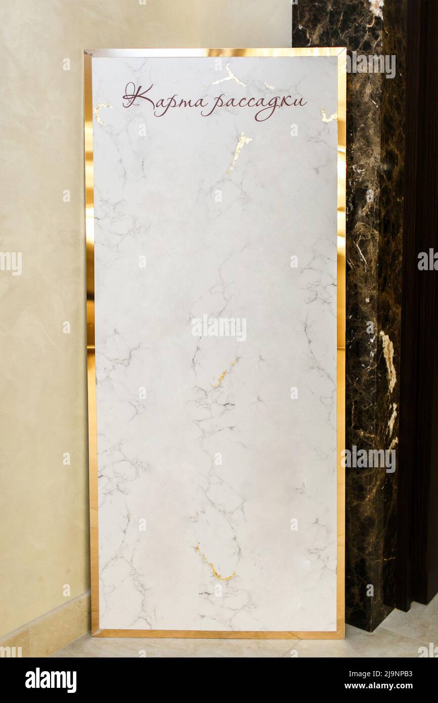 Beautiful elegant stylish wedding guest table list Stock Photo - Alamy