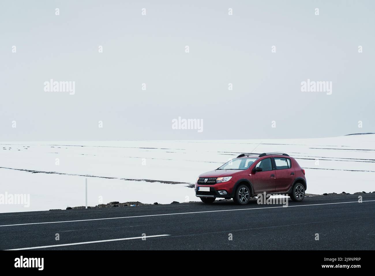 Kars, Turkey - February 25, 2022: Front and side view of a red colored ...