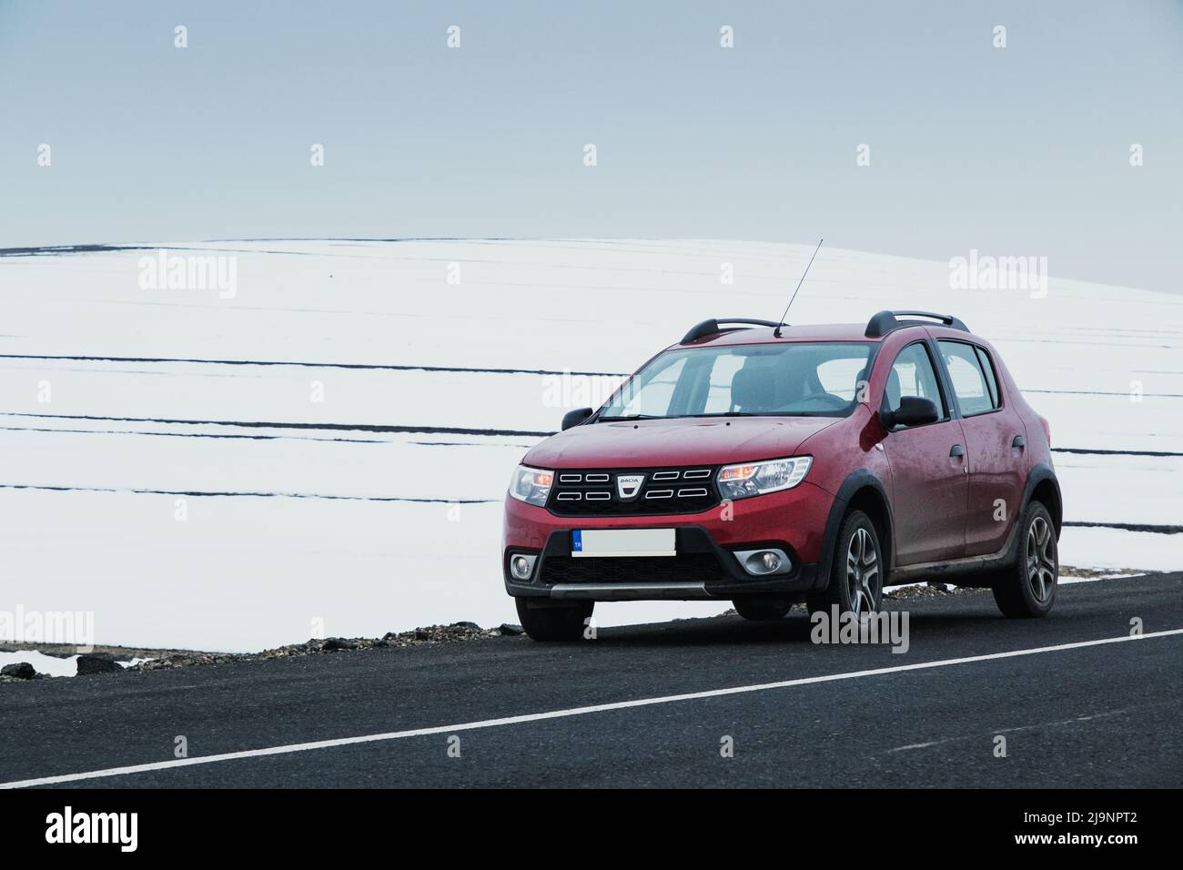 Kars, Turkey - February 25, 2022: Front and side view of a red colored ...