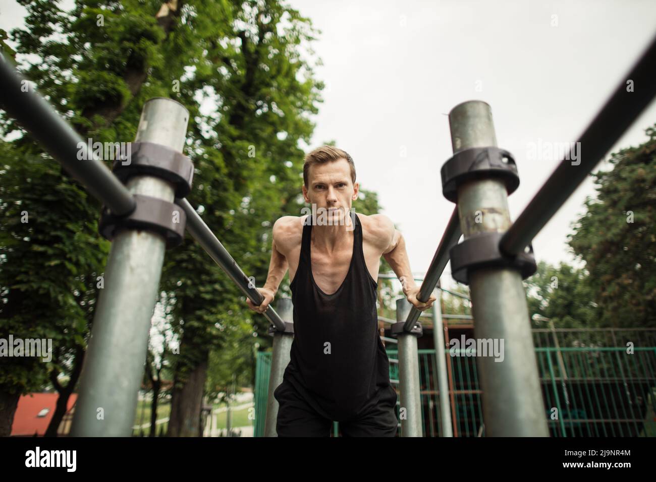 Doing dips on parallel bars hi-res stock photography and images - Alamy