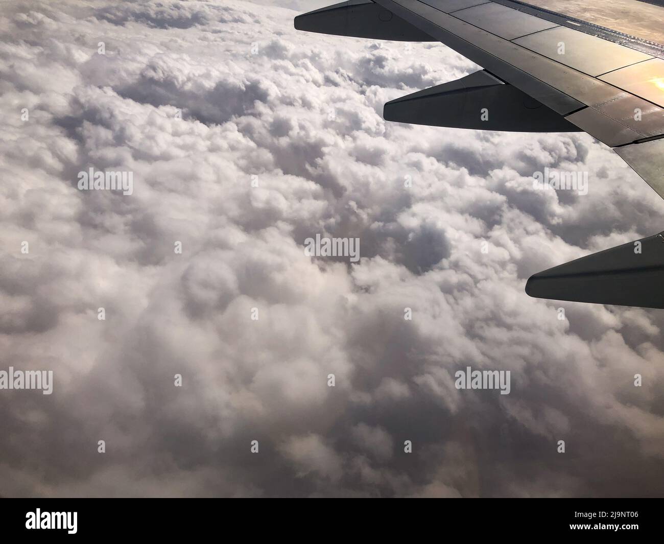 Aerial view of clouds from a plane window Stock Photo - Alamy
