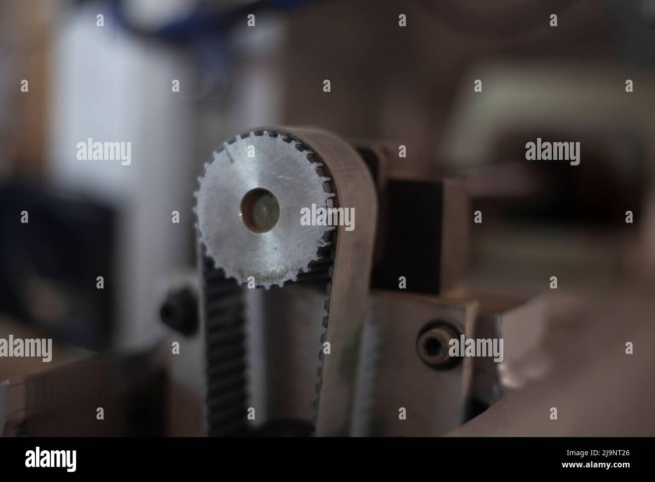 Belt on engine. Gear drive. Equipment details. CNC milling machine ...