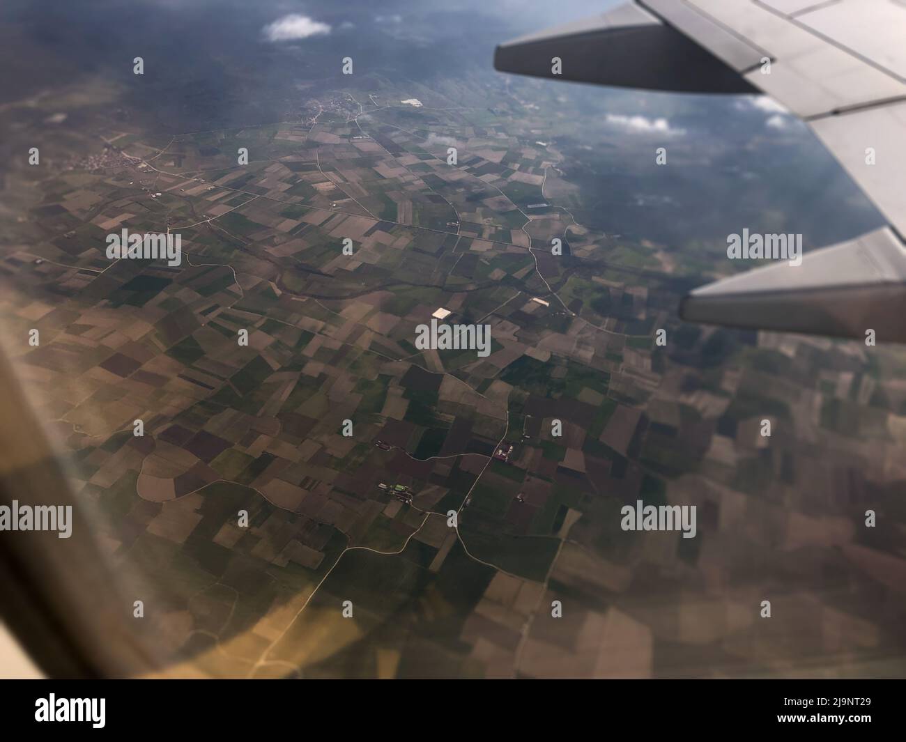 Aerial view of farms and fields from a plane window Stock Photo - Alamy