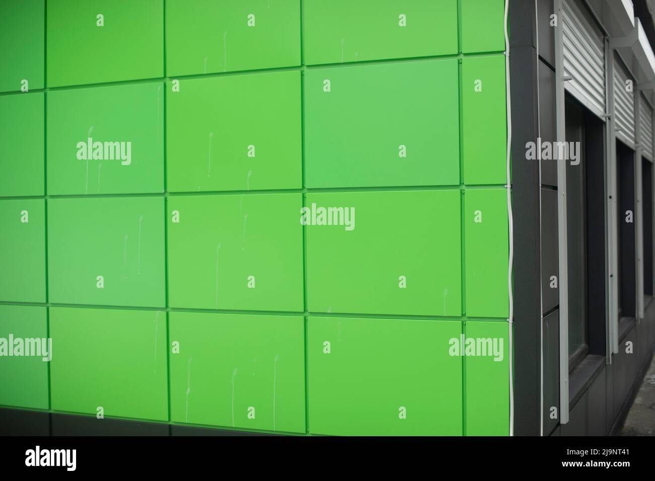 Green building. One-storey office. Paneling. Architecture details Stock ...