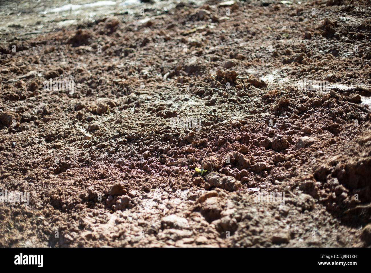 Excavated soil. Broken land. Texture of mud. Clay and soil. Open ...