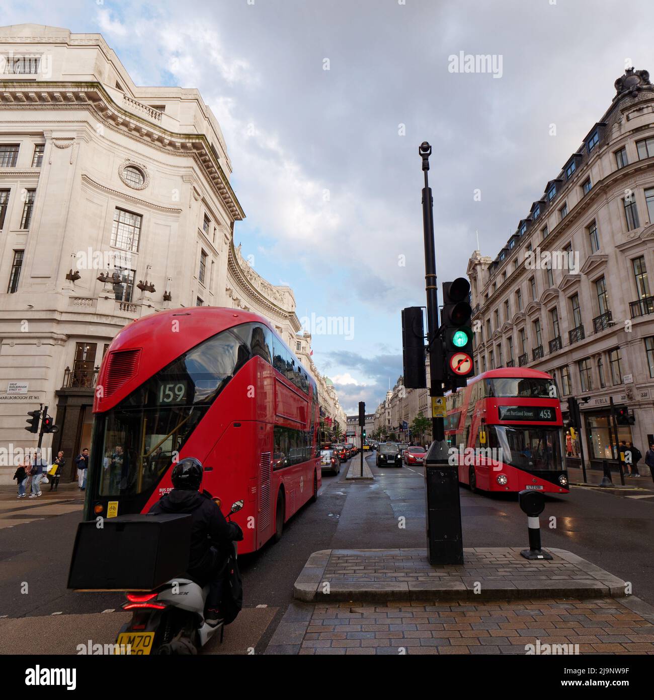 London, Greater London, England, May 11 2022: Traffic at a crossroads ...