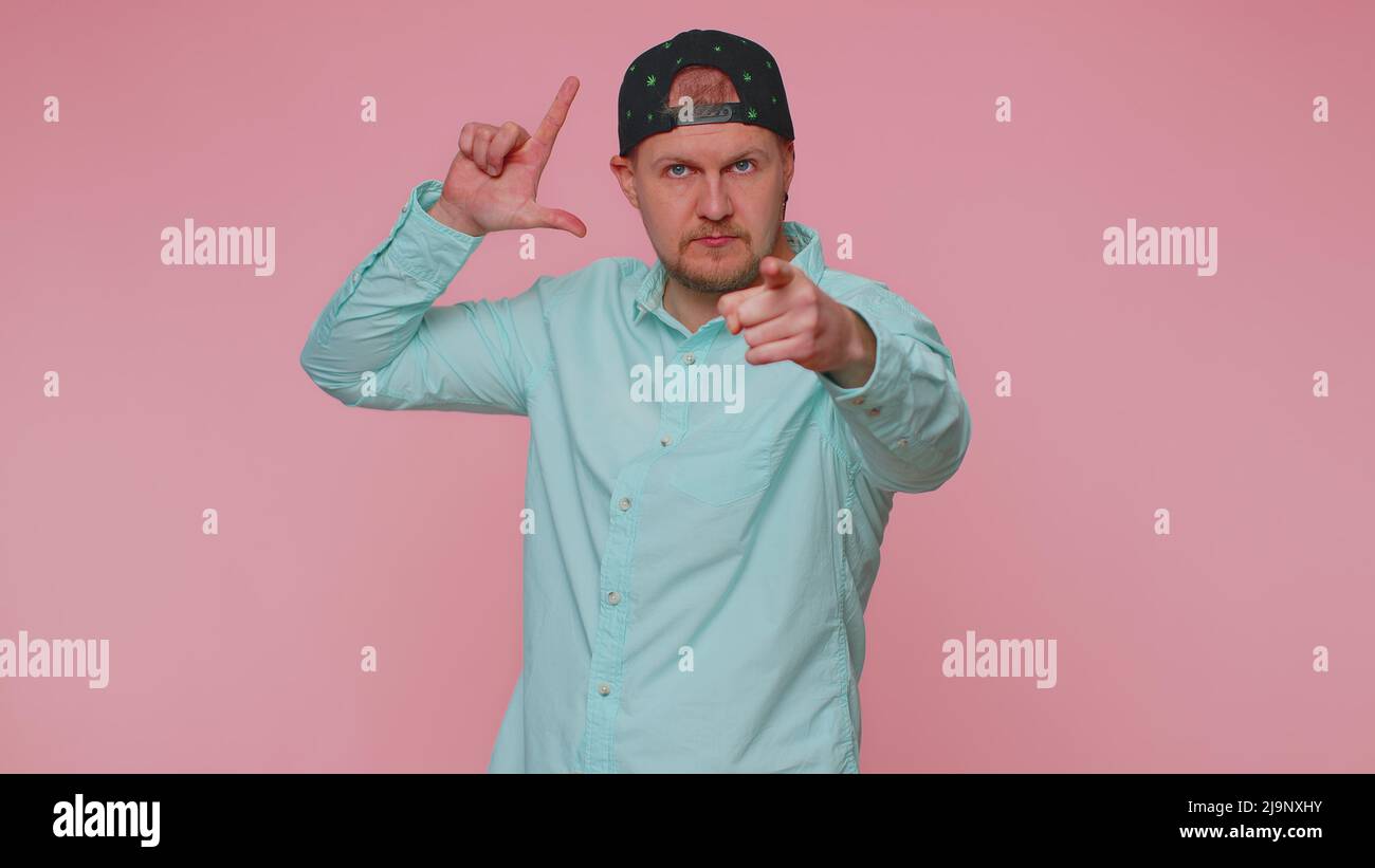 Man showing loser gesture, blaming accusing for unsuccess, disrespect ...