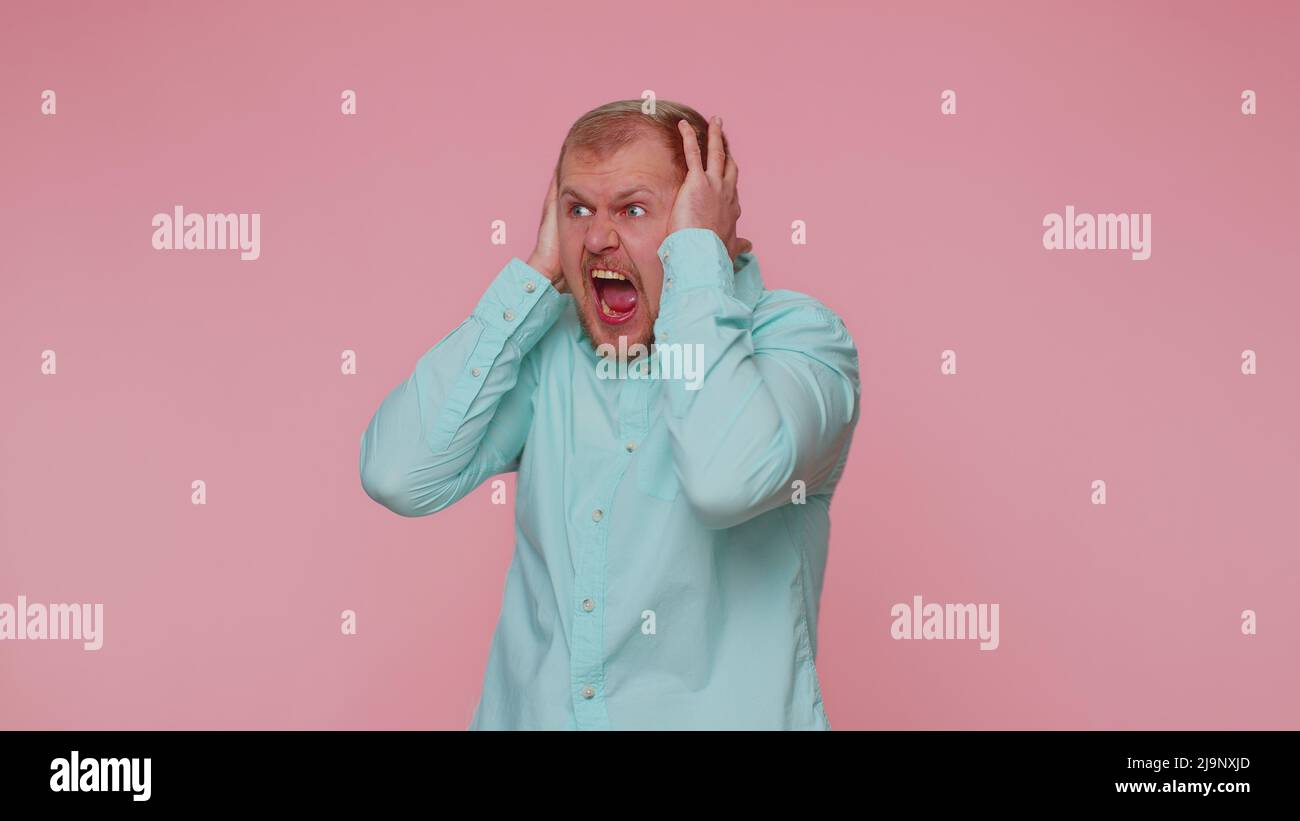 Man scared fearful, covering ears, meeting his own phobia, evidence ...