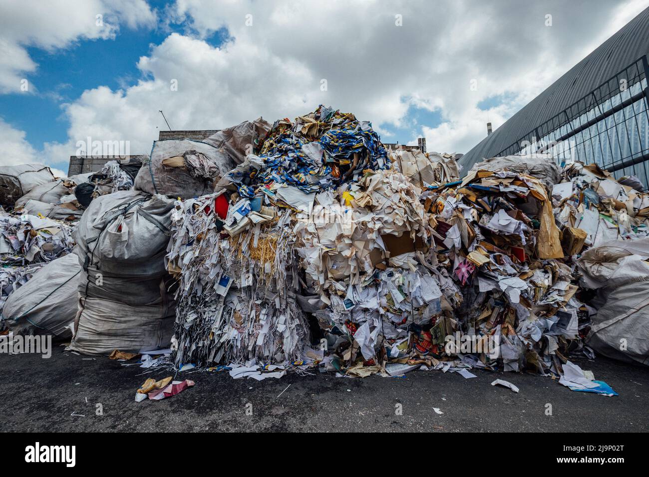 Stack of waste paper at the recycling factory Stock Photo - Alamy