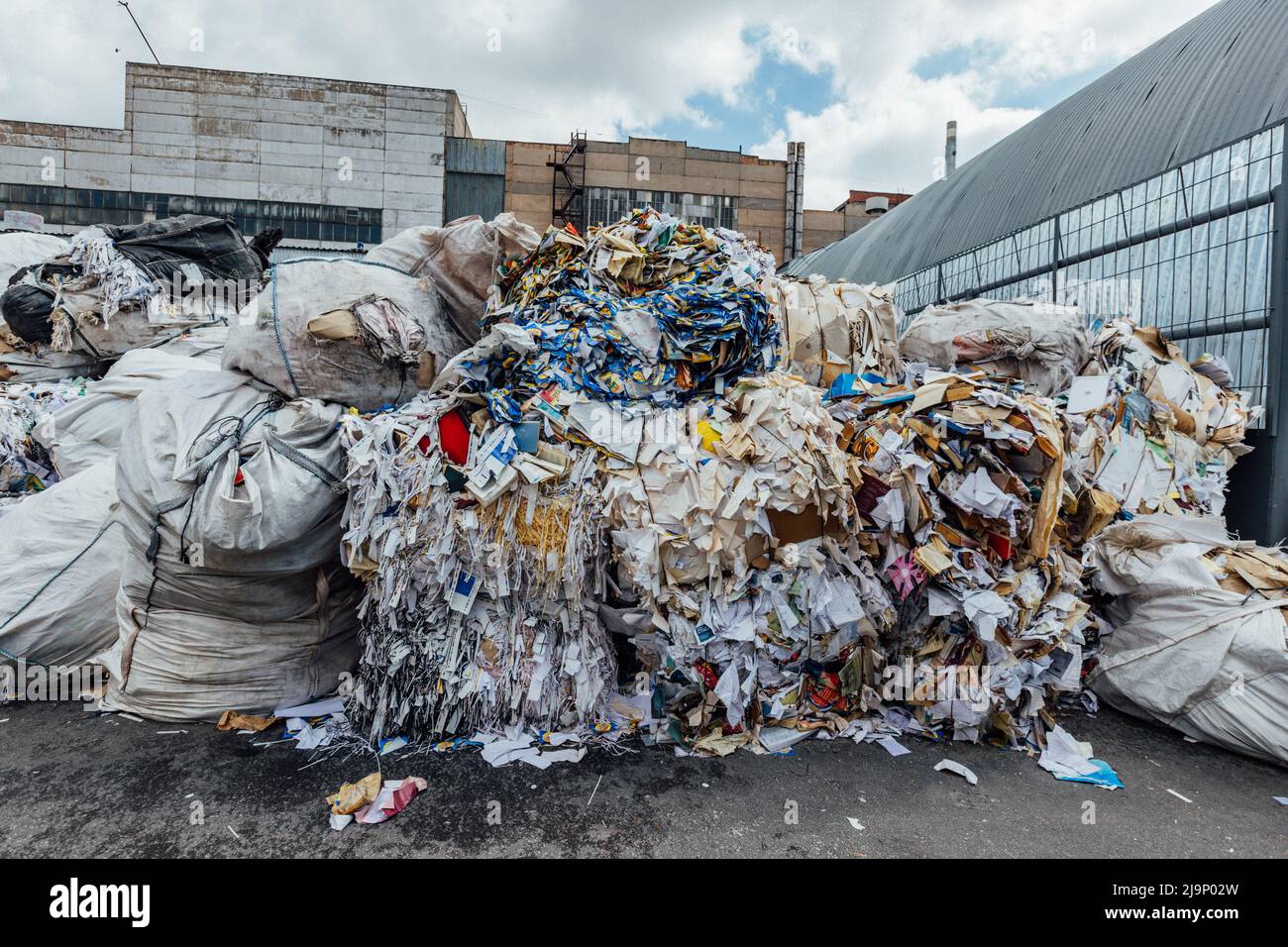 Stack of waste paper at the recycling factory Stock Photo - Alamy
