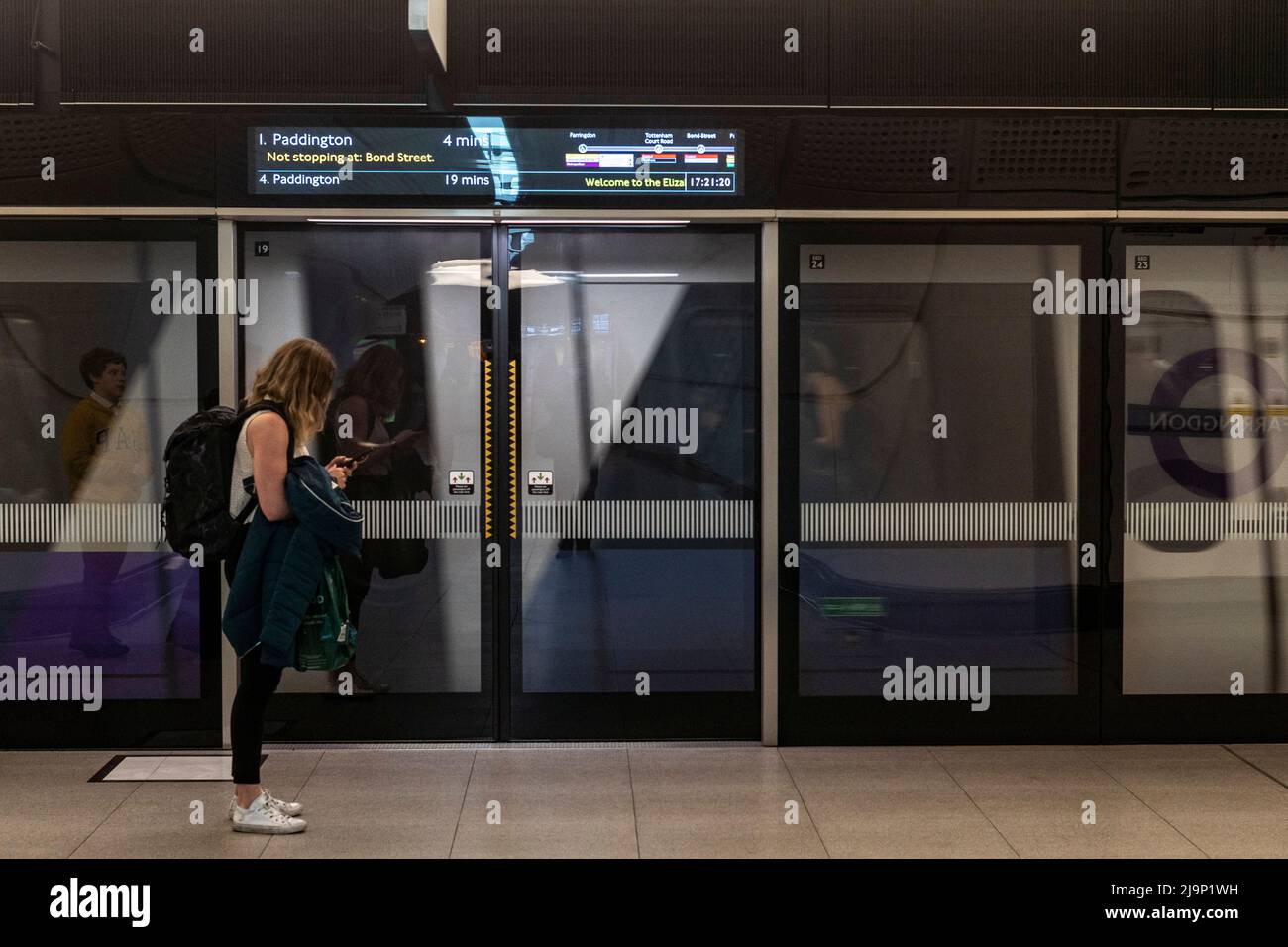 Passengers travel along with the Elizabeth Line in London, as the new ...