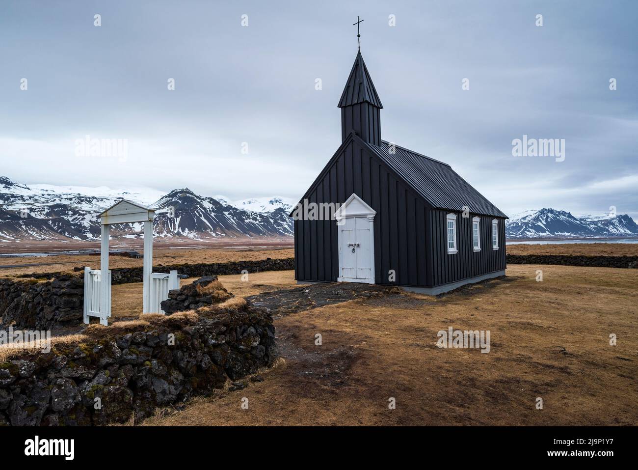 Picturesque scene of the iconic black wooden church of Búðir (or Budir ...