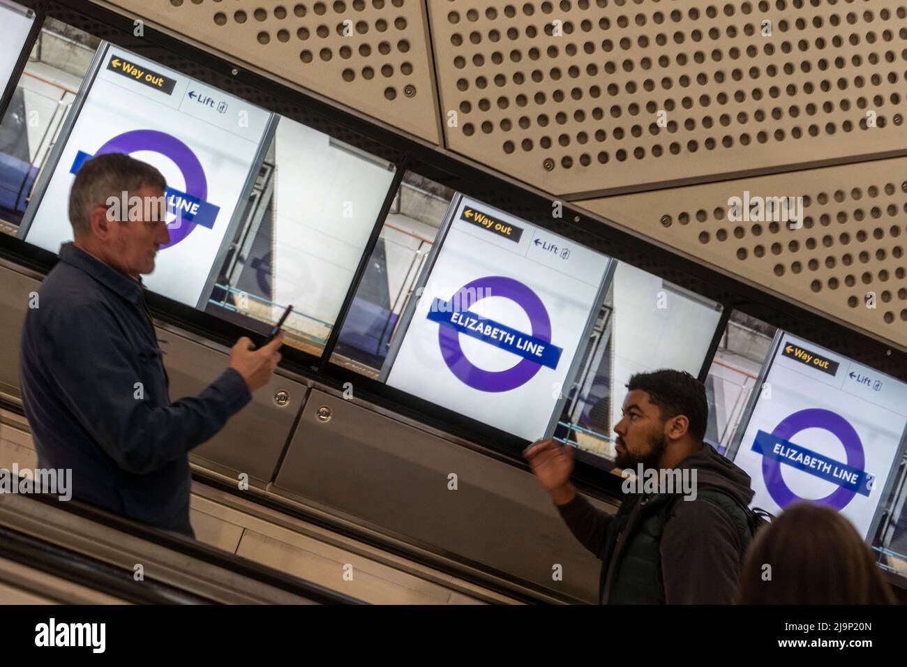 Passengers travel along with the Elizabeth Line in London, as the new ...