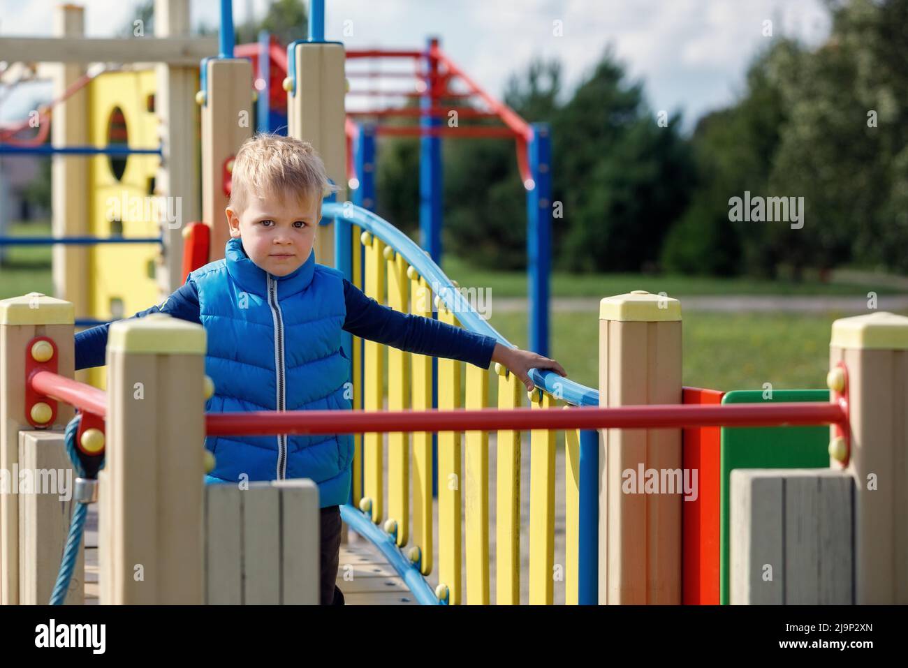 The happy boy spends his free time in the colorful maze of the ...