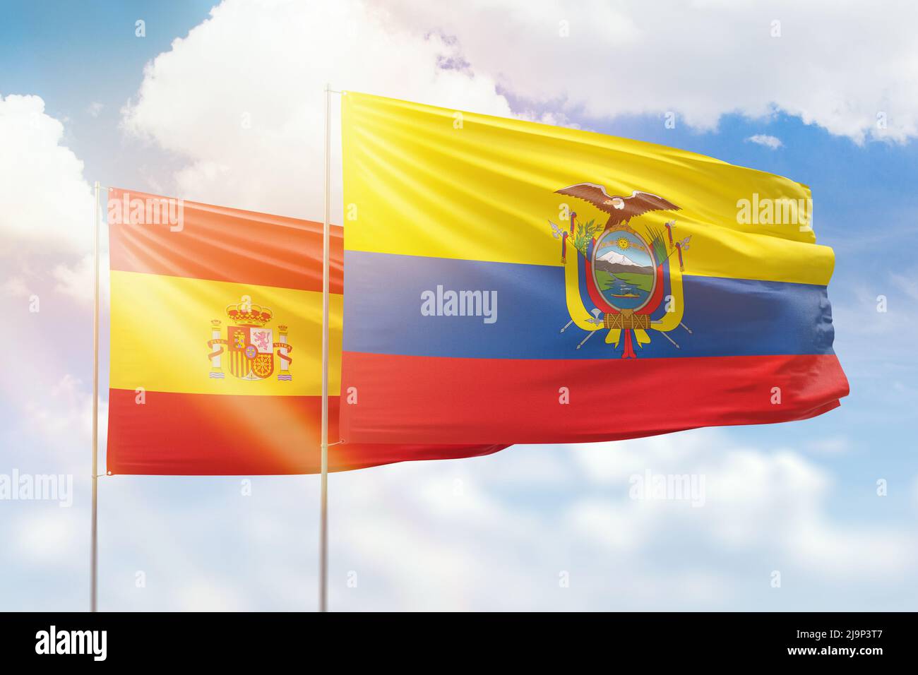Sunny blue sky and flags of ecuador and spain Stock Photo - Alamy