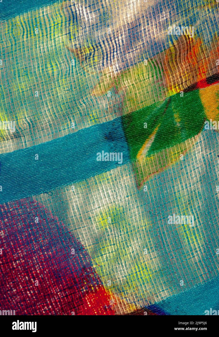 Layers of cloth are backlit and photo is taken thru layers of antique ...