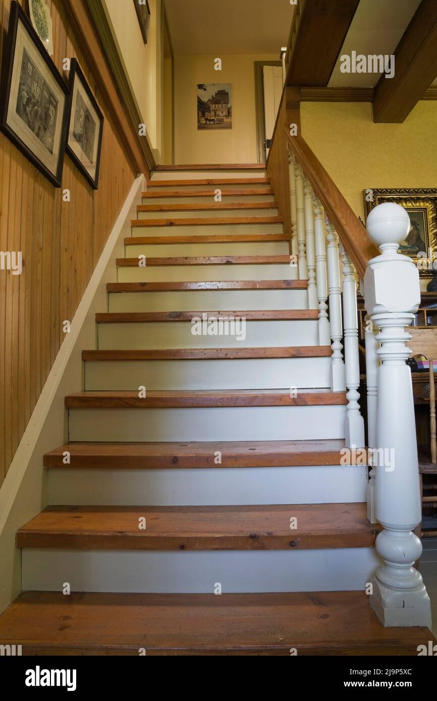 Staircase leading to upstairs floor in old circa 1741 cottage style ...