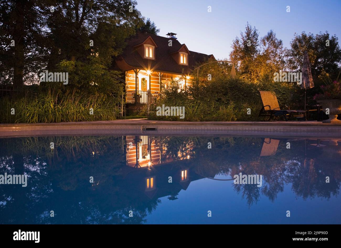 Replica of old 1800s Canadiana cottage style log home with inground ...