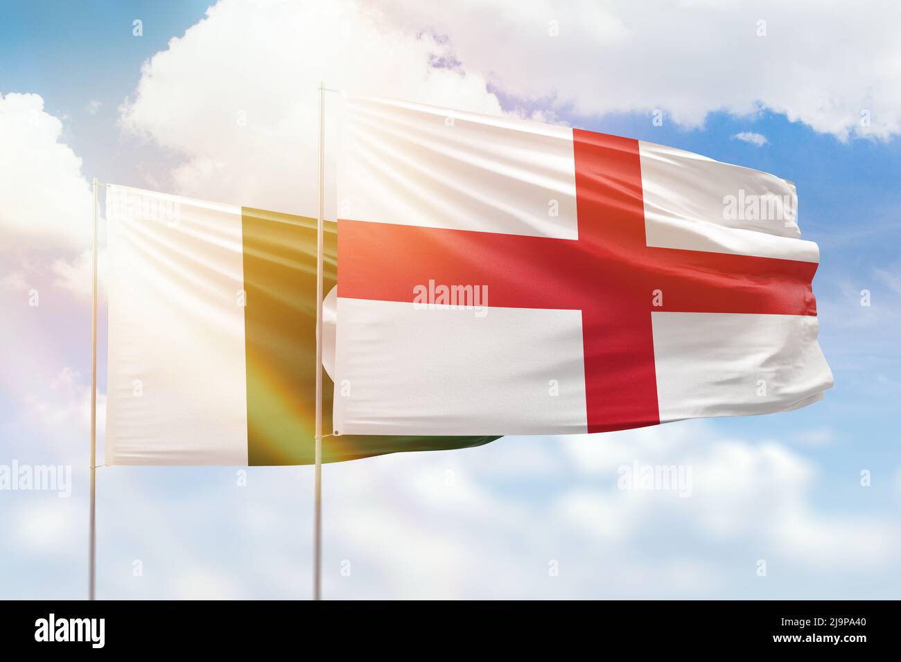 Sunny blue sky and flags of england and pakistan Stock Photo - Alamy
