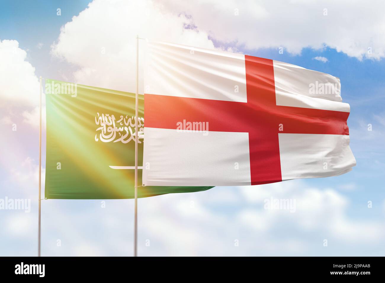 Sunny blue sky and flags of england and saudi arabia Stock Photo - Alamy