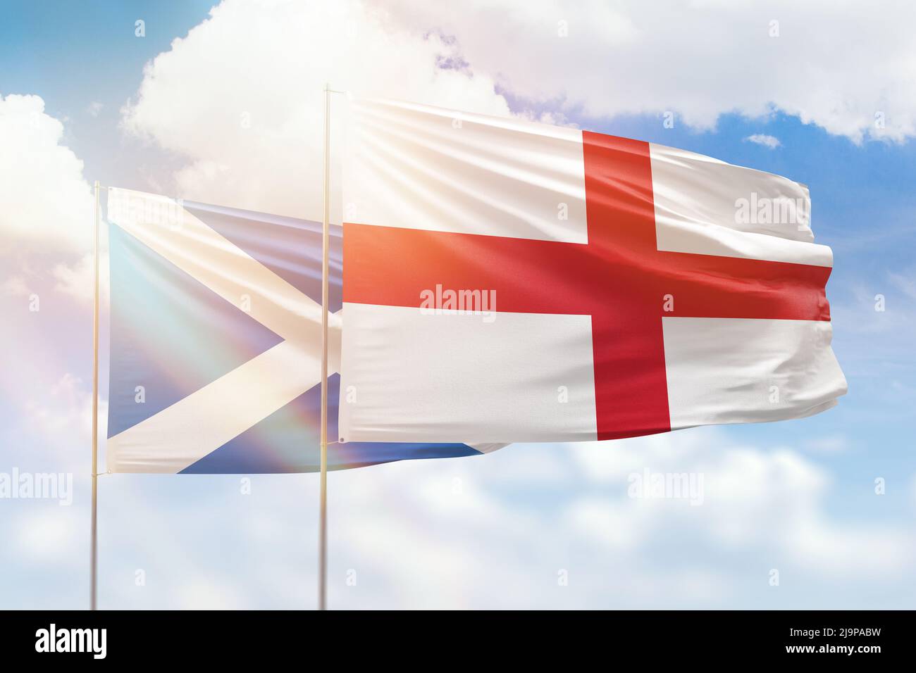 Sunny blue sky and flags of england and scotland Stock Photo - Alamy