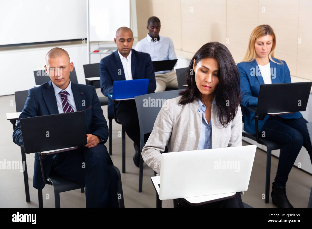 international group of businessmen with computer at world training ...