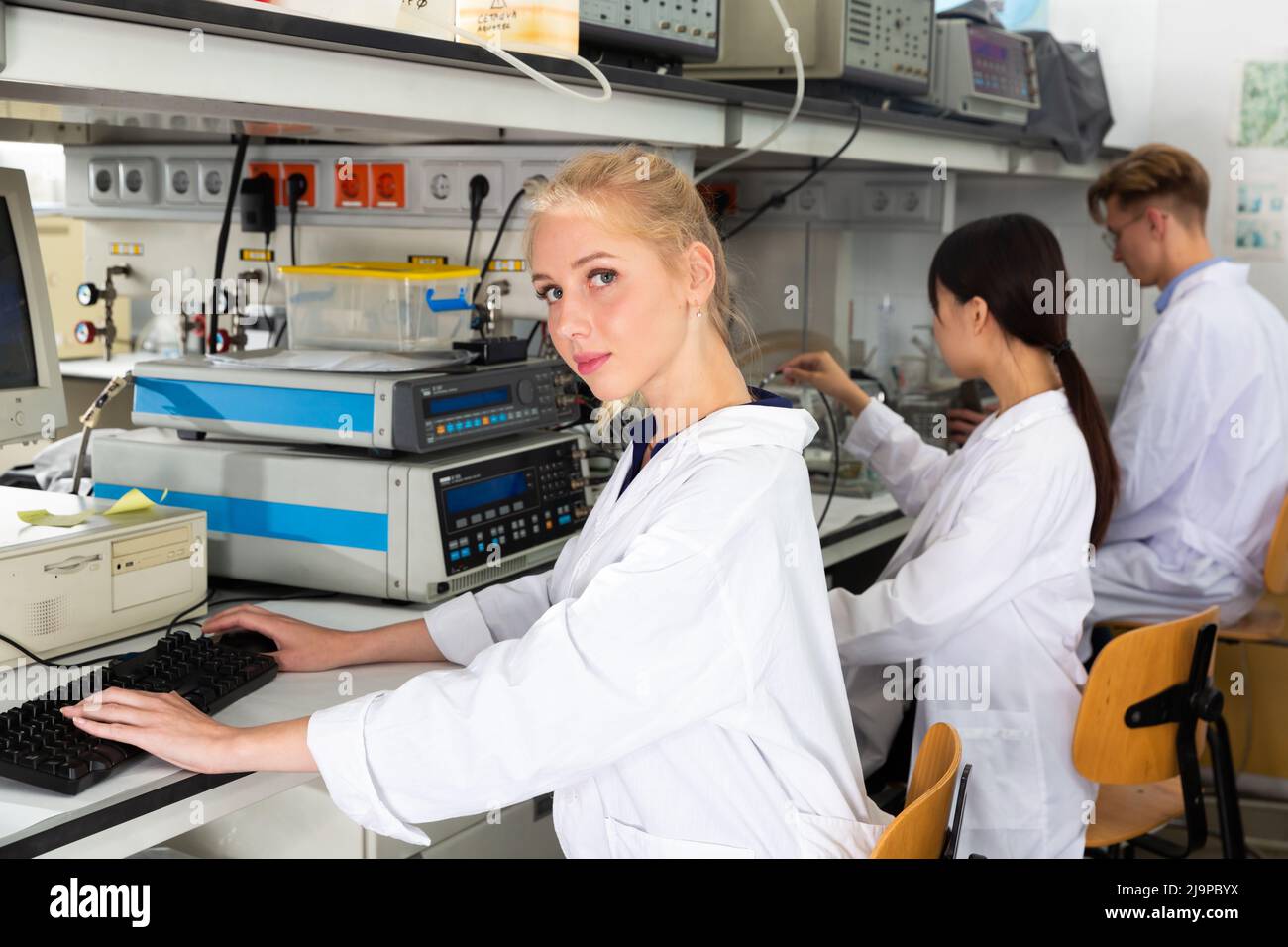Students engaged in research at lab Stock Photo - Alamy