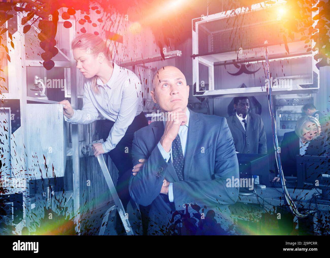 Embarrassed thinking man in escape room Stock Photo - Alamy