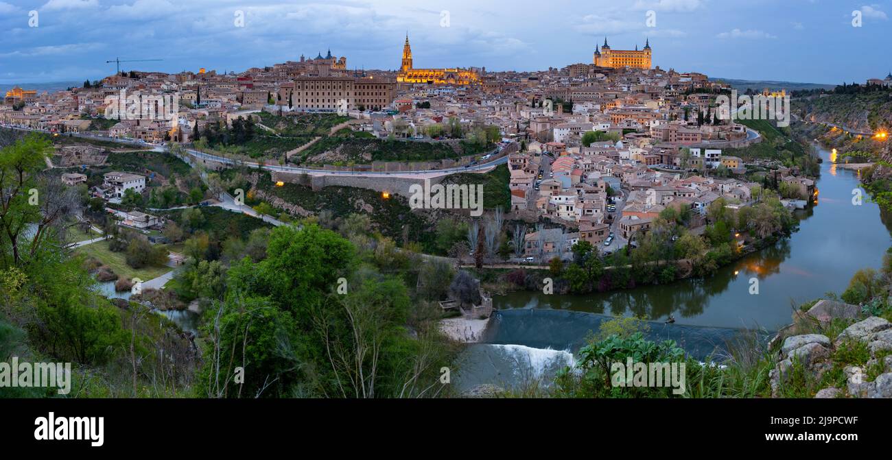 Twilight view of Toledo cityscape with illuminated Cathedral and ...