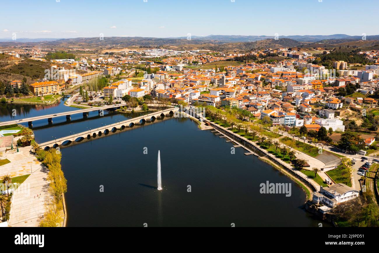 Aerial view of Mirandela with fountain and bridges crossing Tua river ...
