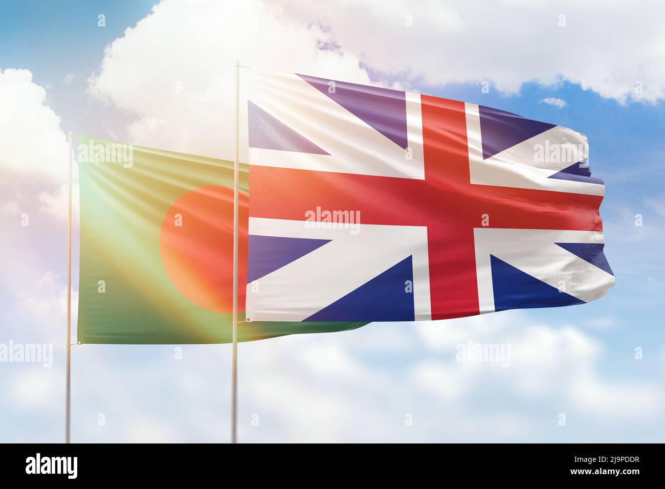 Sunny blue sky and flags of great britain and bangladesh Stock Photo ...