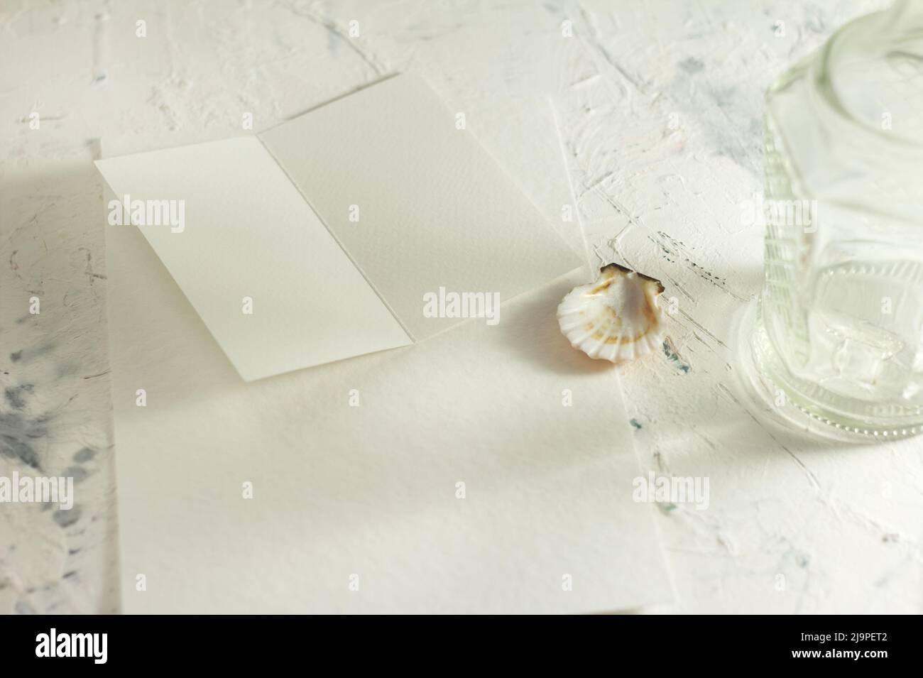 Modern stationery still life with warm sunlight. Closeup foto of blank ...