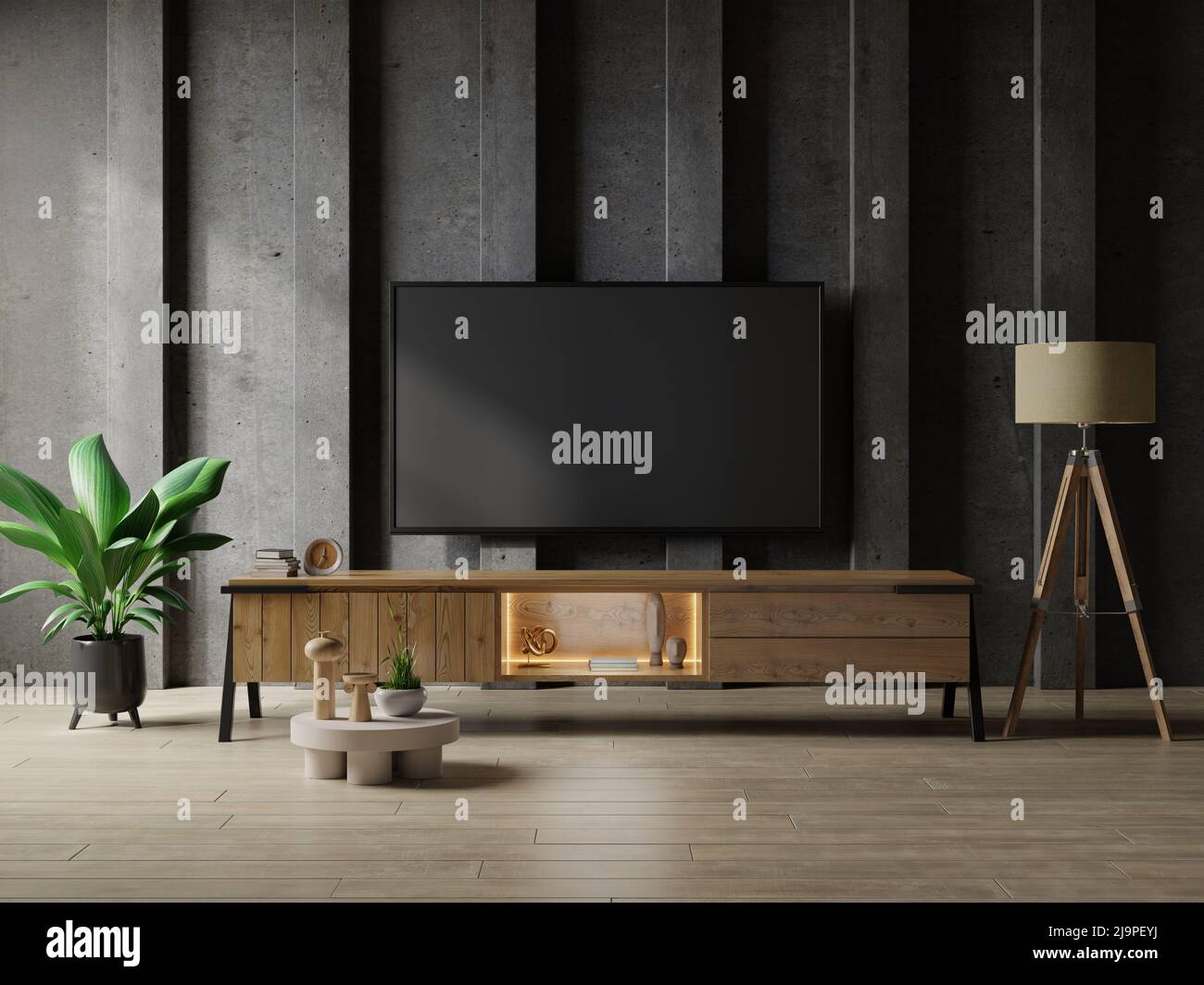 TV in modern living room with table and plant on concrete wall ...