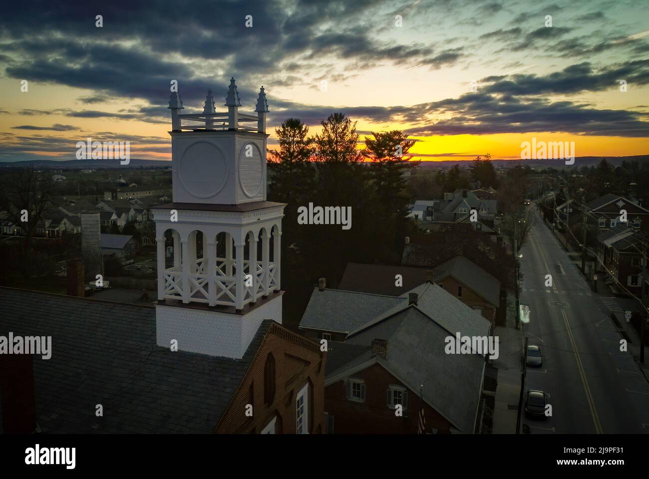 Aerial View of a Sunrise in a Small Town With Light Coming Over Horizon ...