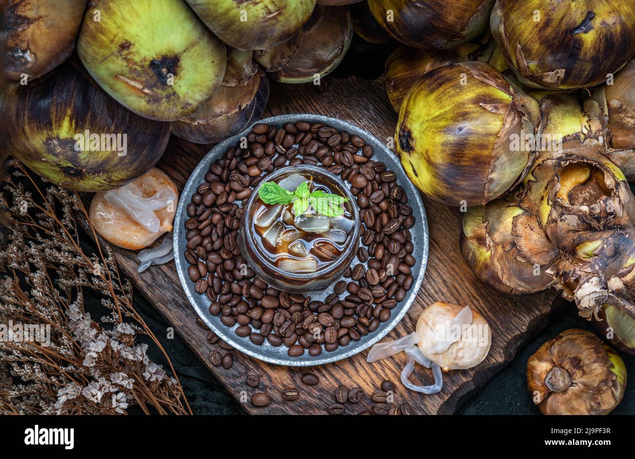 Sliced fresh toddy palm in fresh toddy palm juice with crushed ice ...