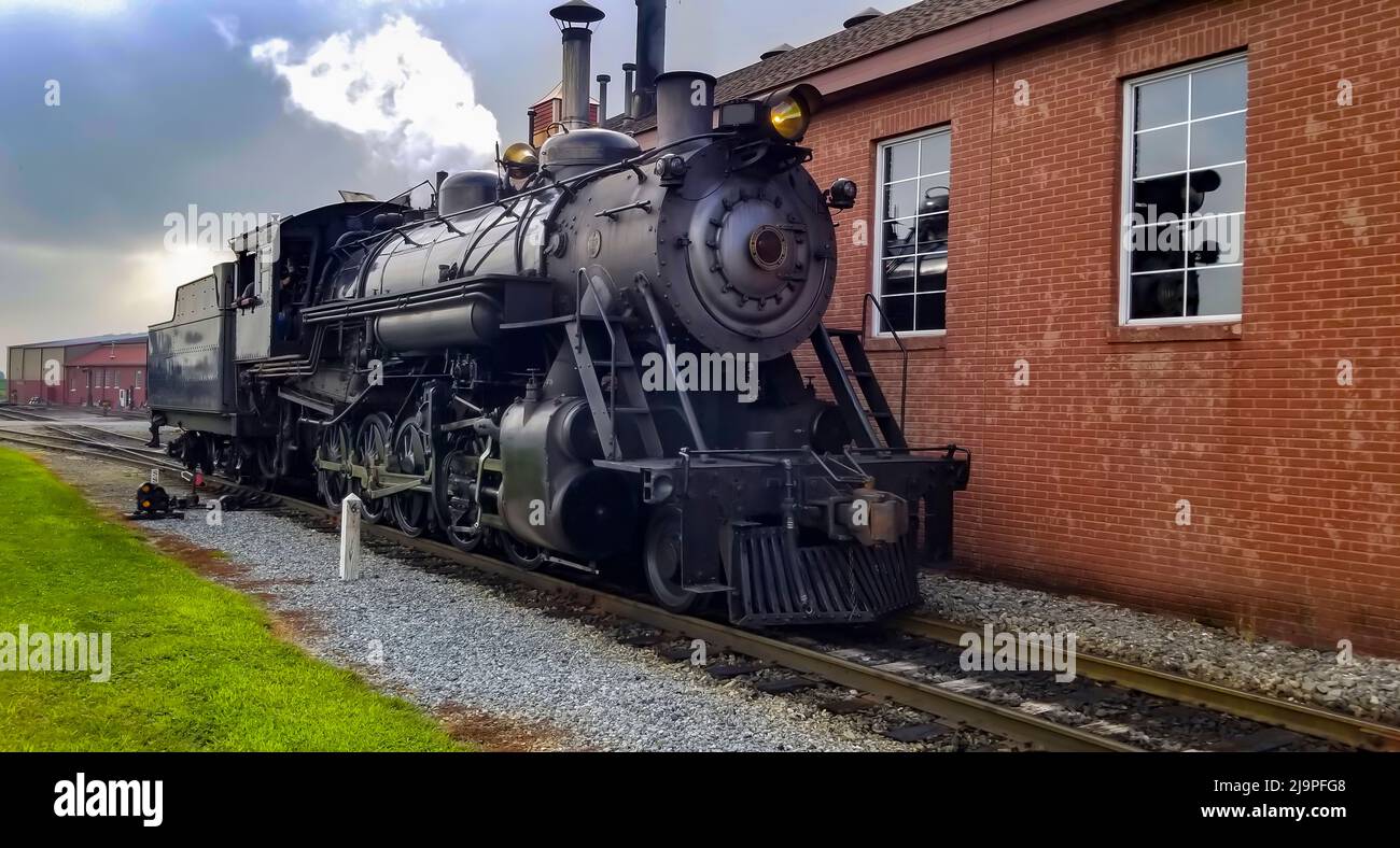 A Restored Steam Engine Getting Ready for Service, Blowing Smoke and ...