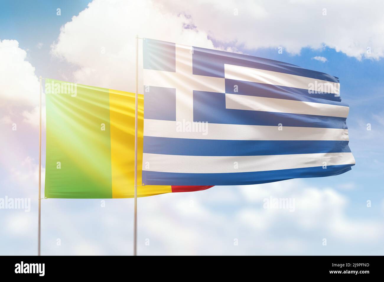 Sunny blue sky and flags of greece and mali Stock Photo - Alamy