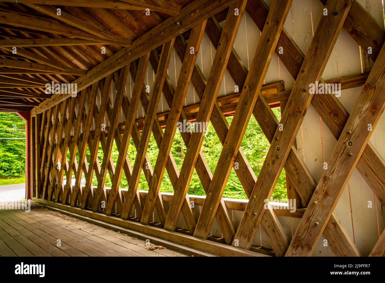 View of a Covered Bridge's Timber Frame Construction on a Cloudy Day ...