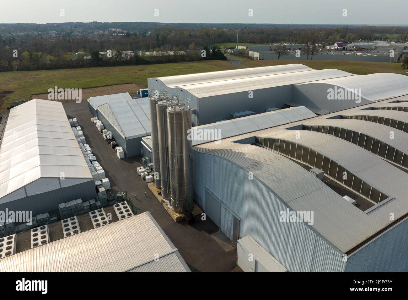 Aerial view of modern factory structure for production and distribution ...
