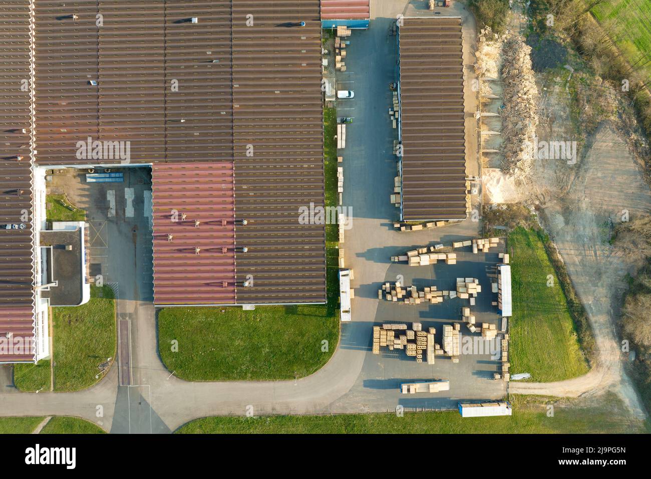 Aerial view of new factory building for producing and shipping of ...