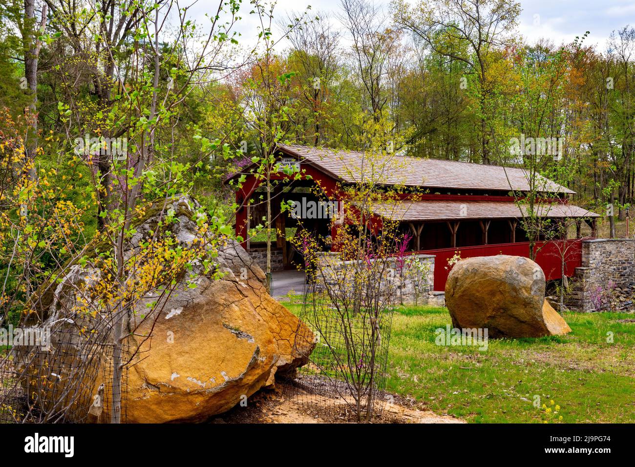 View of a Restored Burr Truss Covered Bridge on a Country Road With ...